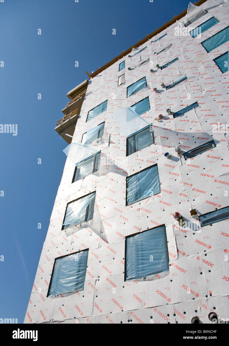 The wall of the block of flats is covered with Paroc Tyvek stone wool ...