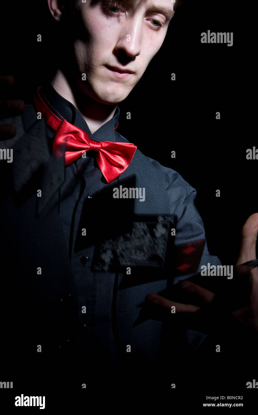 Magician doing tricks hi-res stock photography and images - Alamy