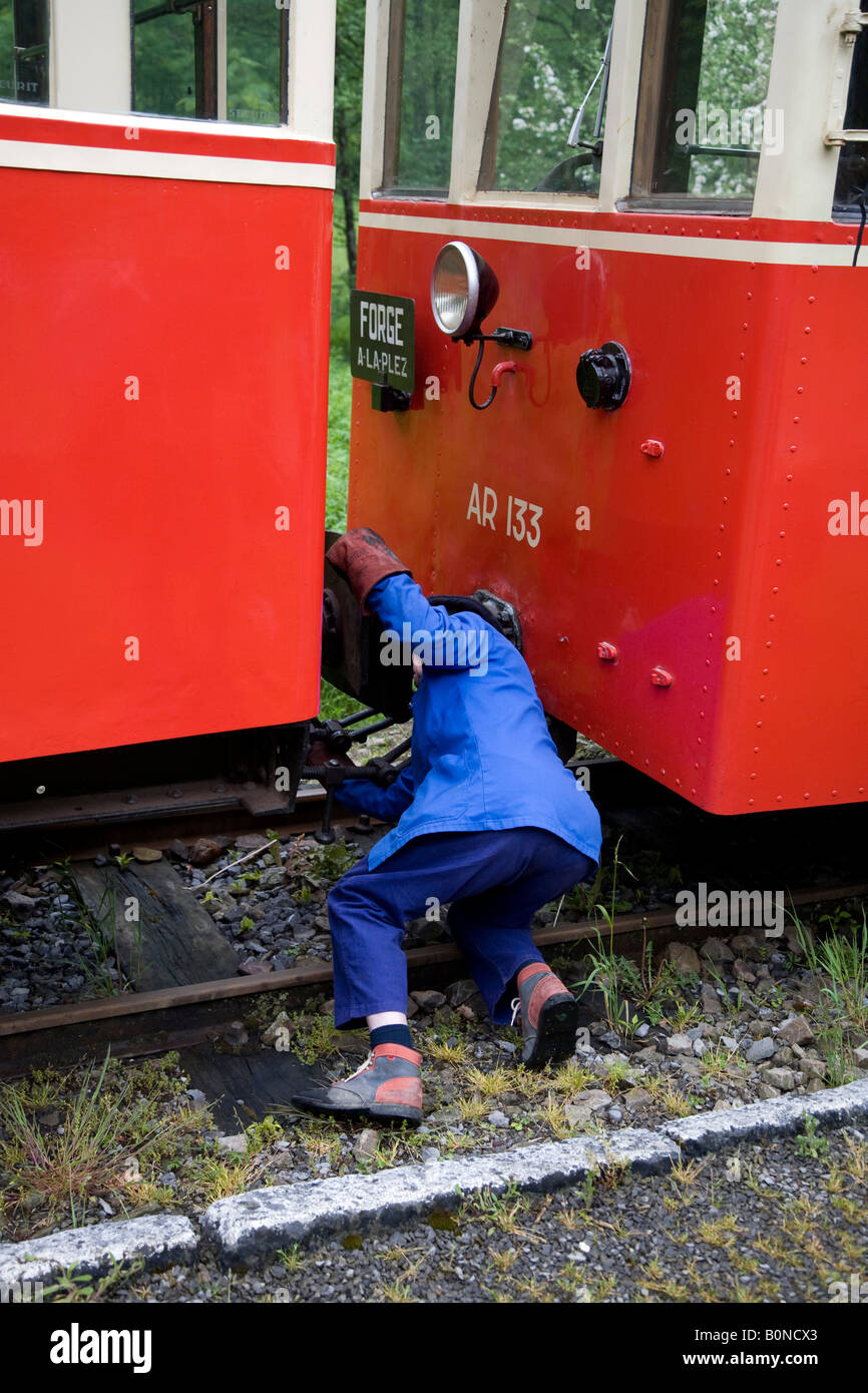 Coupling up carriages at the tram museum at Aisne in the Ardennes ...
