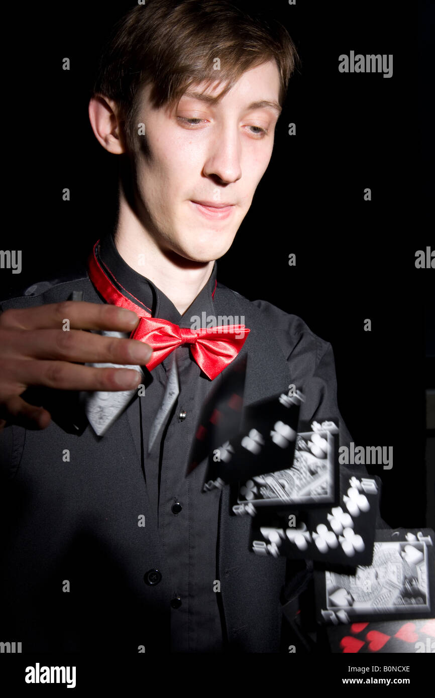 Magician doing tricks hi-res stock photography and images - Alamy