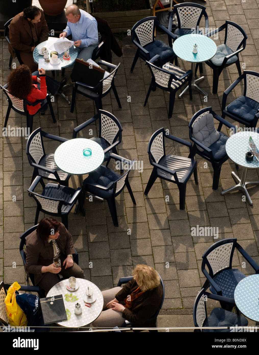 Berlin Germany people in outdoor cafe Stock Photo - Alamy