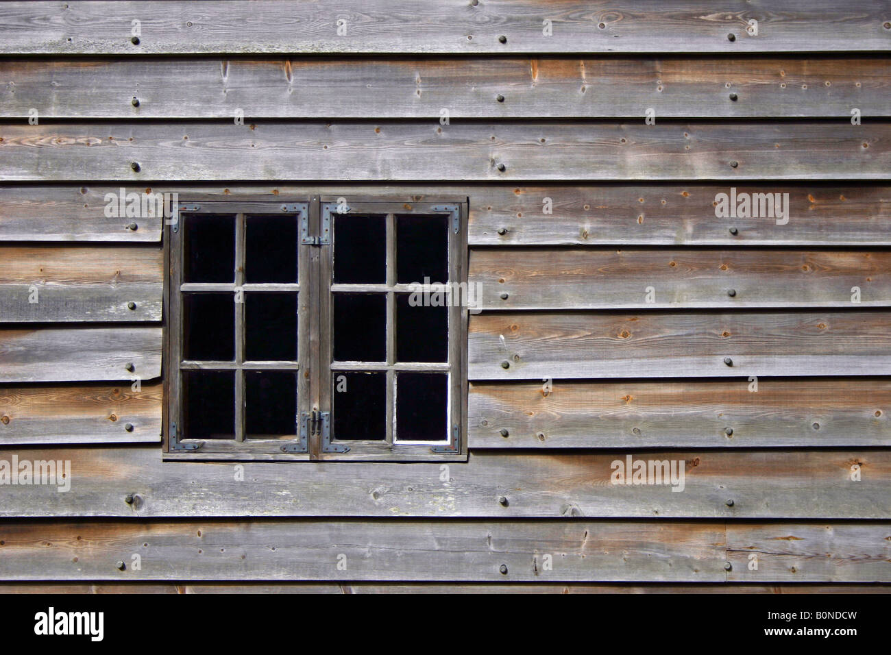 Traditional window panes in an old wooden house at Hordamuseet, Stend ...