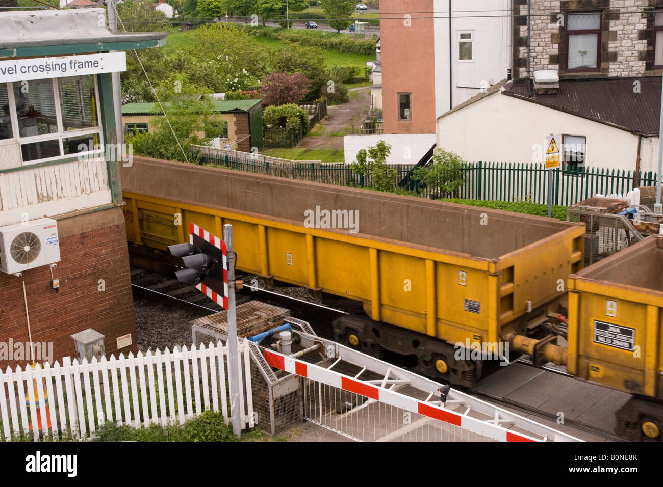 EWS Track Maintenance Train passes signal box across a level crossing ...