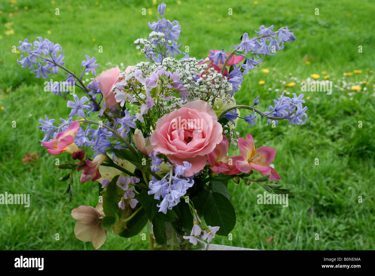 Vase of spring and early summer flowers Stock Photo - Alamy
