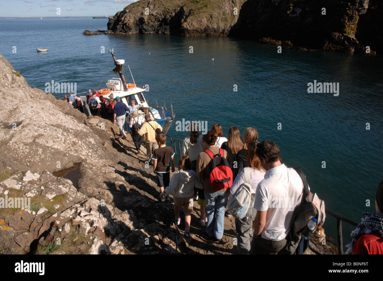 Tourists boarding the Dale Princess at Martins Haven Pembrokeshire ...