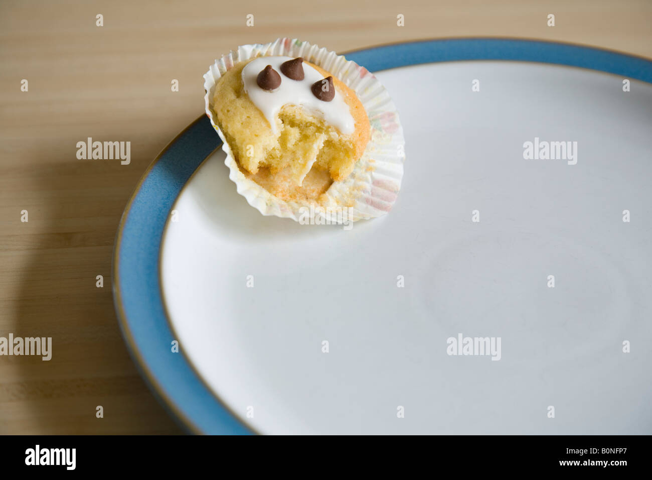 Half eaten cupcake on white hi-res stock photography and images - Alamy