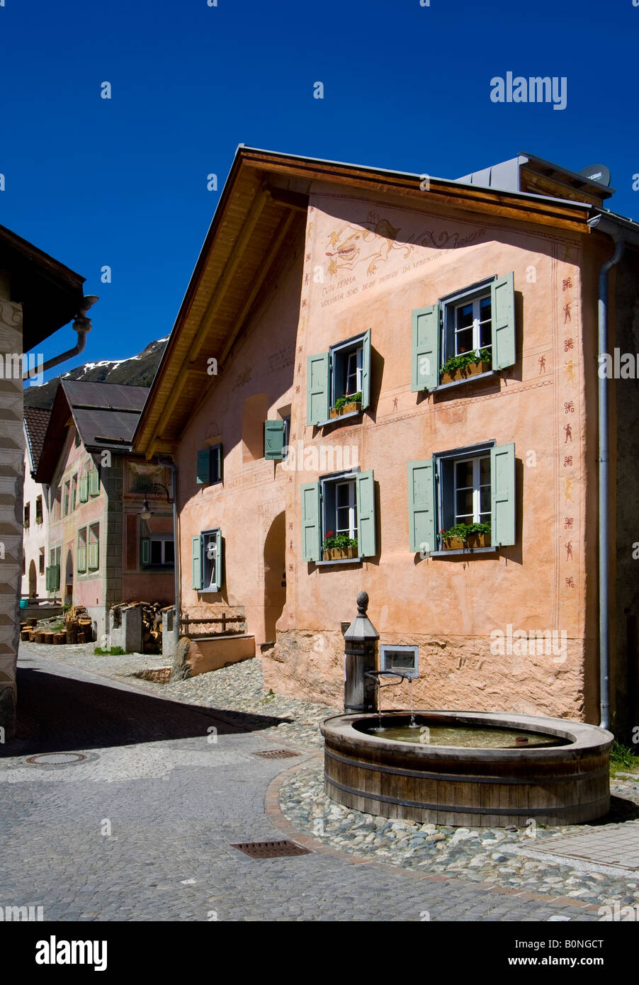 Village house and well Guarda Engadin Grisons Stock Photo - Alamy