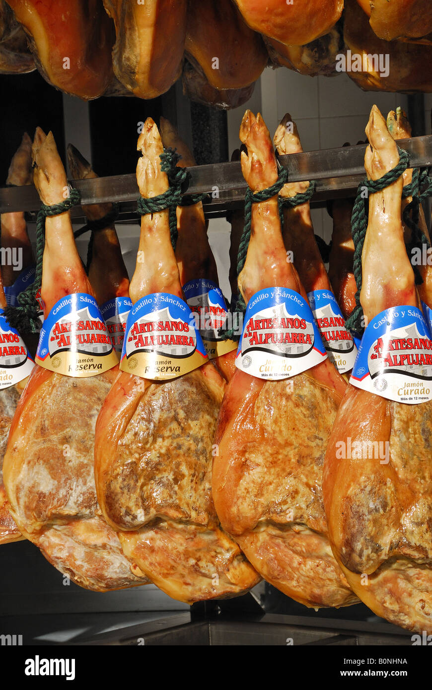 Spanish ham hanging in Trevelez Stock Photo - Alamy