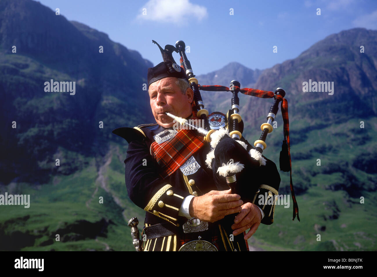 Scottish piper Alexander McPhee in Glen Coe Stock Photo - Alamy