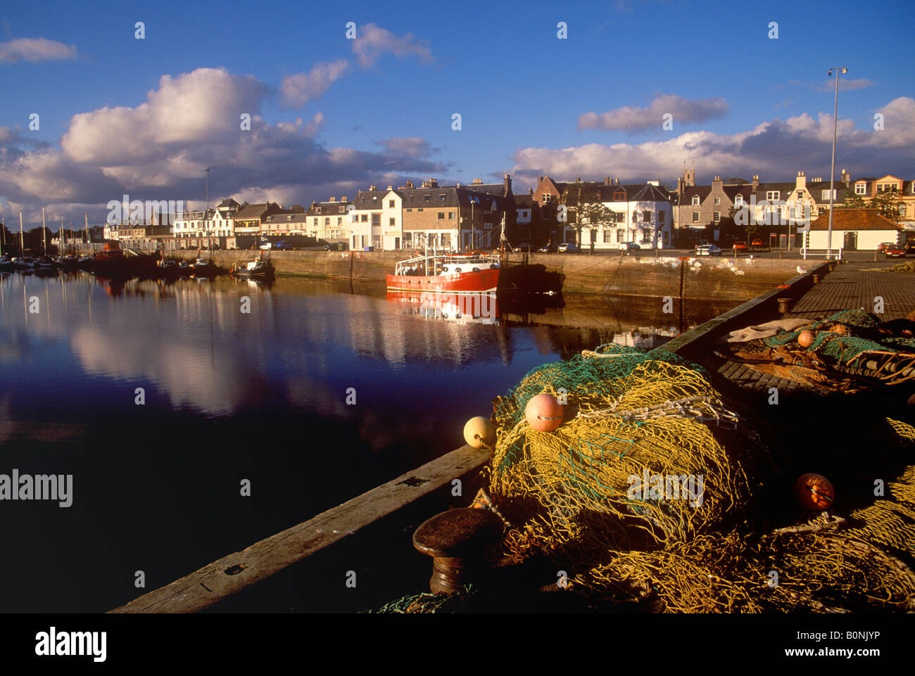 Fishing harbour in evening light at Stornoway, the principal town on ...