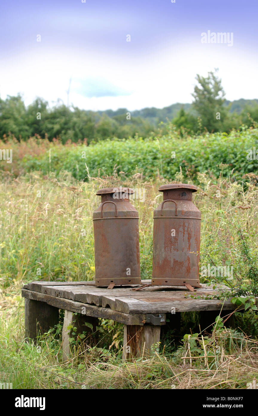 Old fashioned milk churns on hi-res stock photography and images - Alamy