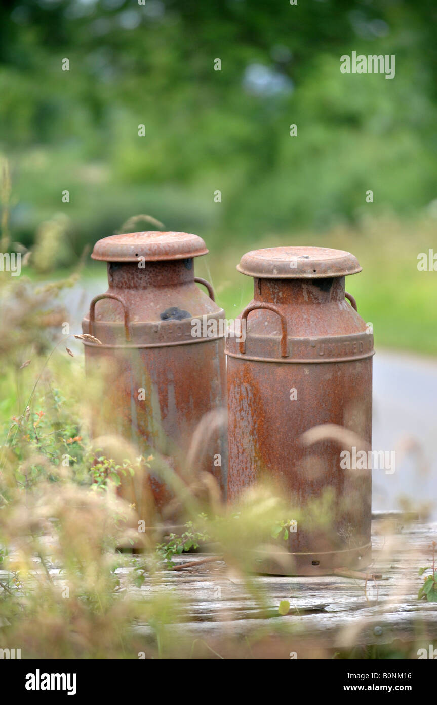 Old fashioned milk churns on hi-res stock photography and images - Alamy