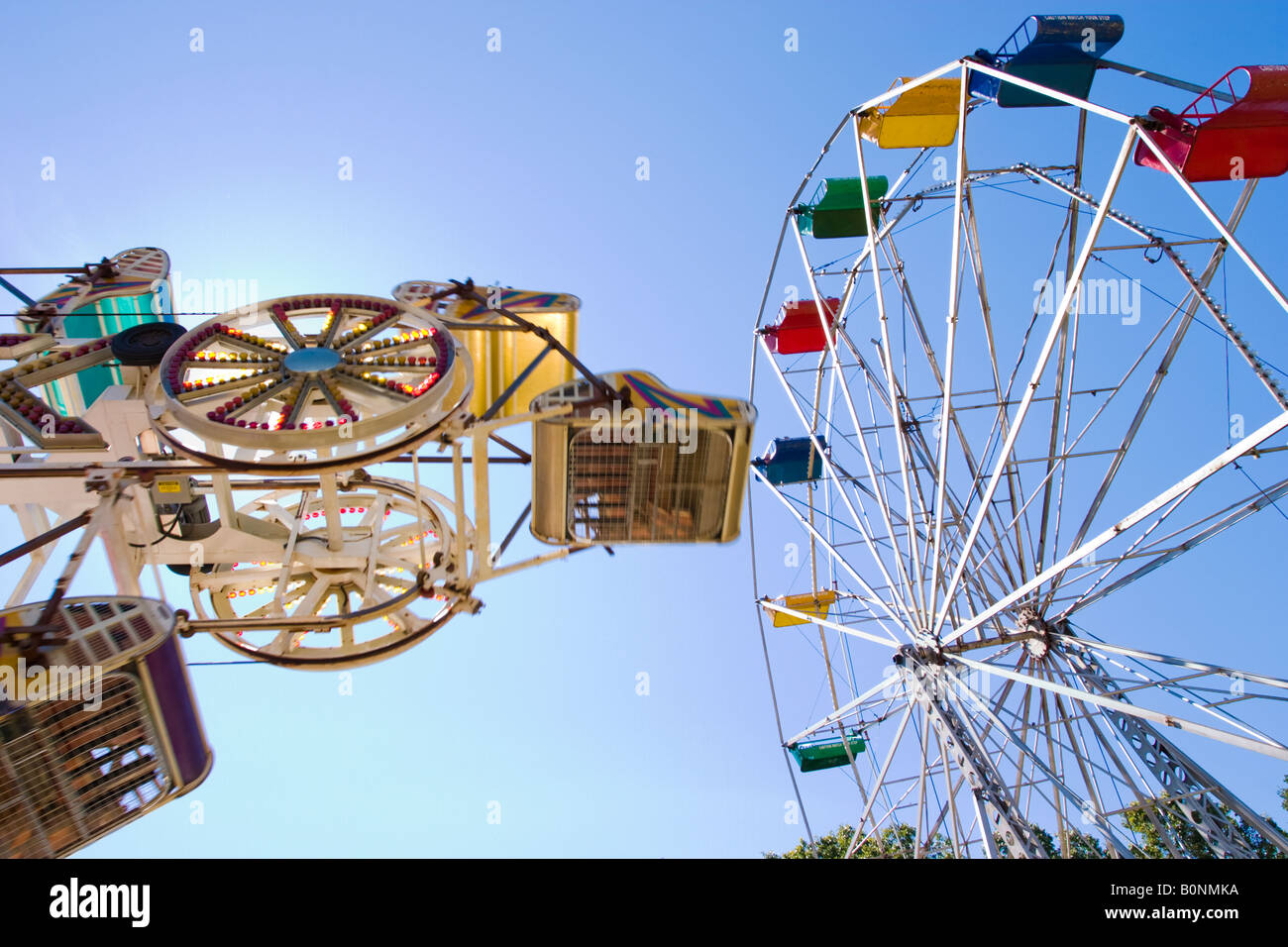 Close up of two rides at a fair Stock Photo - Alamy