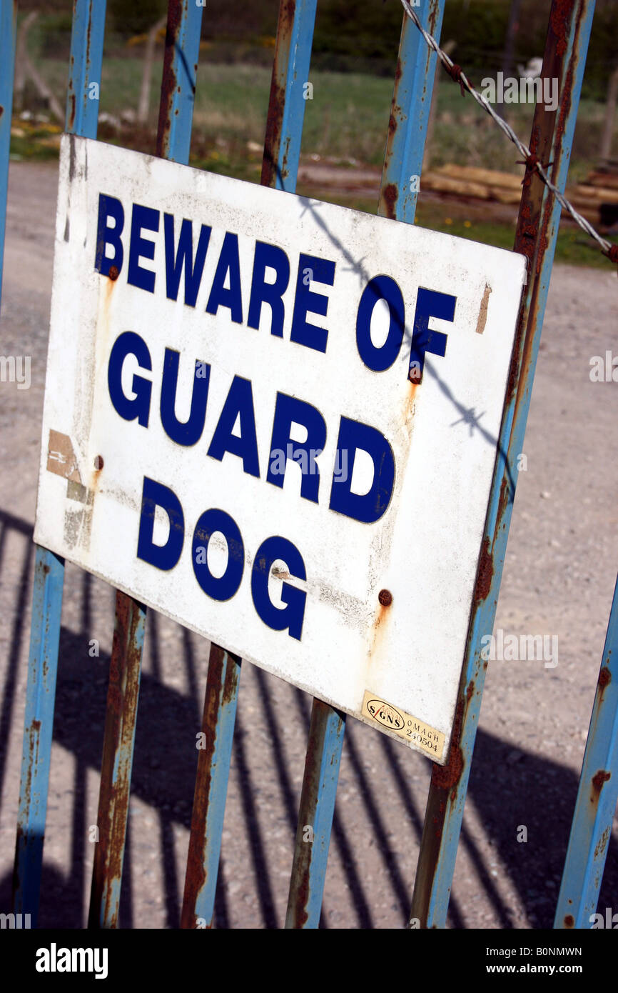 Beware of guard dog sign on steel gate to building site, Ireland Stock ...