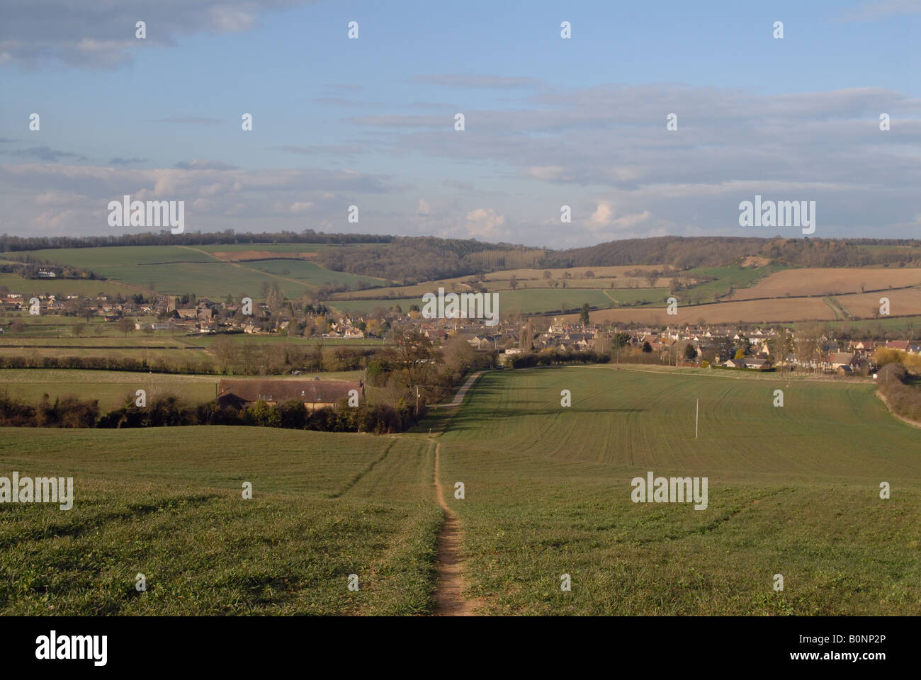 View of Long Compton Warwickshire with Whichford Woods behind Stock ...
