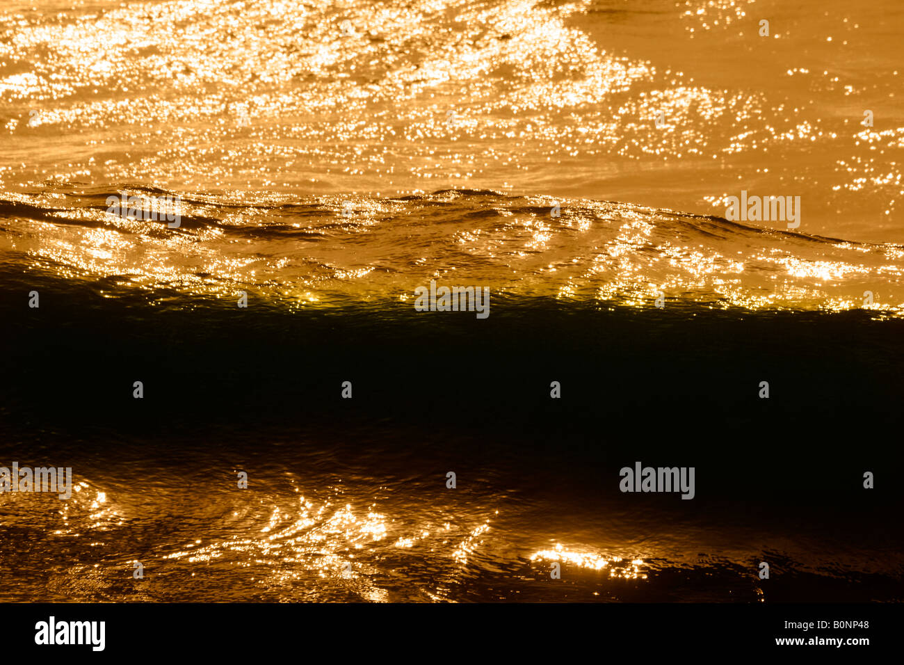 Sunlight shining on water Stock Photo - Alamy