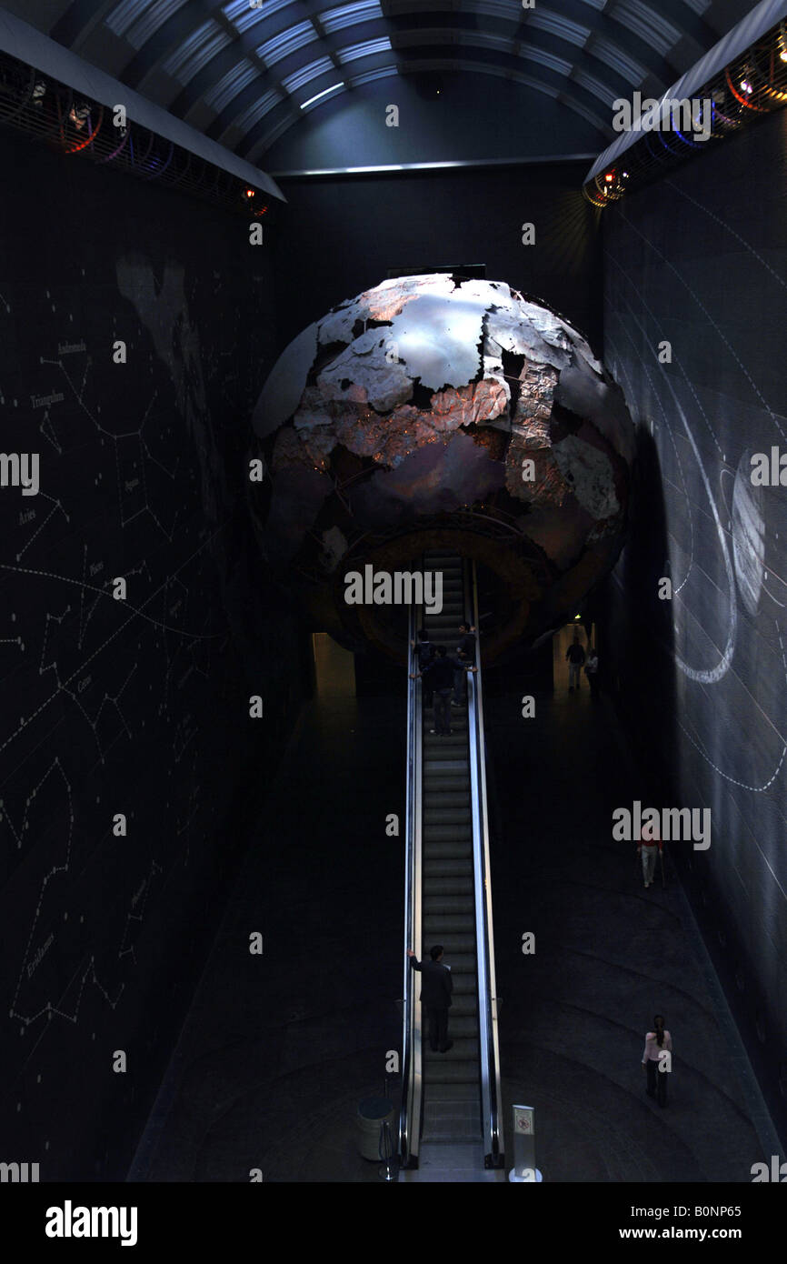 Escalator passing thru Planet Earth in the Natural History Museum ...