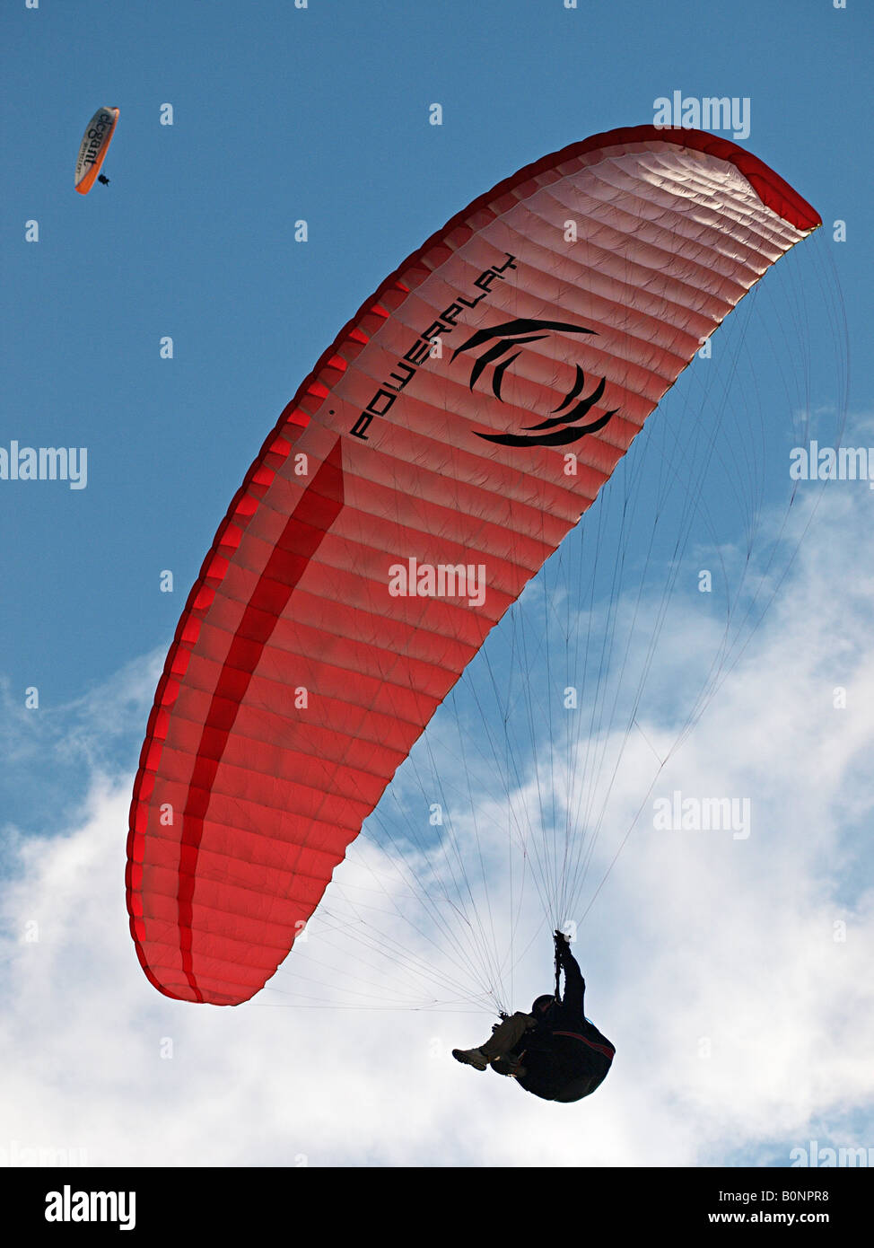 Paraglider with red canopy hi-res stock photography and images - Alamy