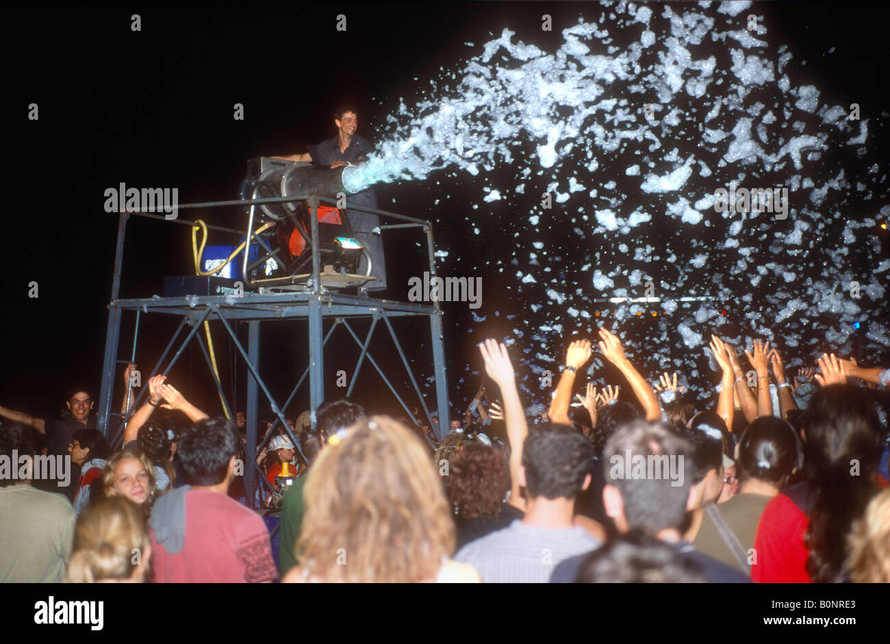 Foam cannon sprays happy crowds Stock Photo - Alamy