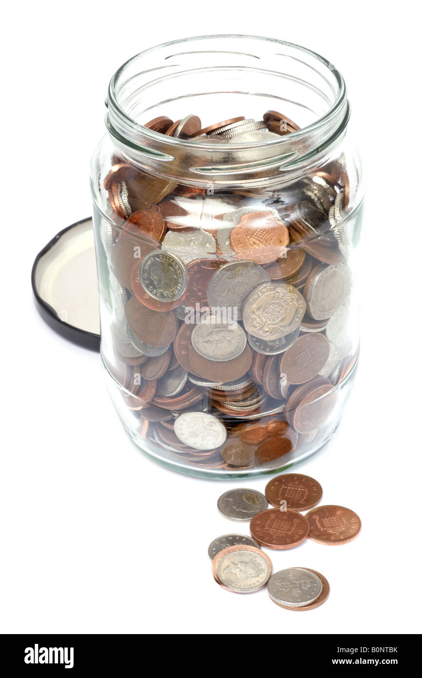 Coins in a Glass Jar with Lid Off Stock Photo - Alamy