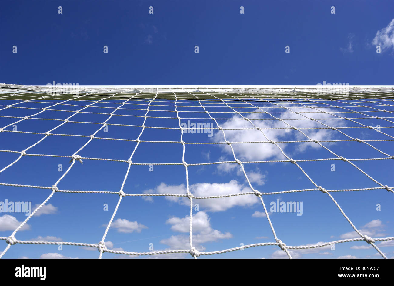 Soccer netting against blue sky Stock Photo - Alamy