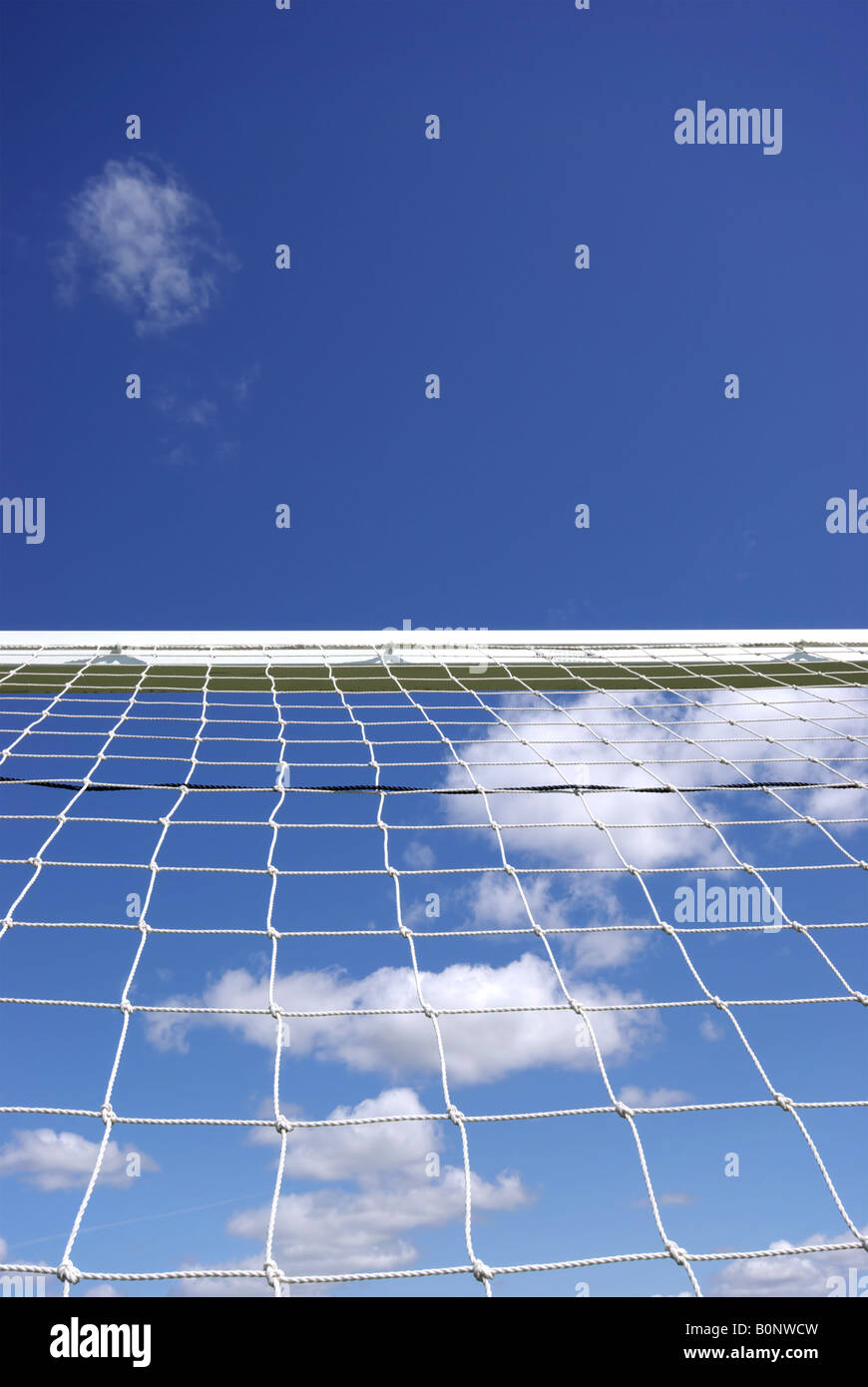 Soccer netting against blue sky Stock Photo - Alamy