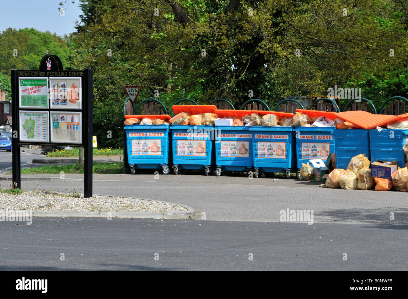 Local authority run roadside rubbish recycling centre with bins ...