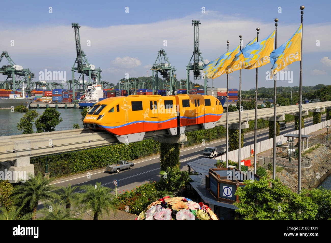 Singapore Sentosa Express monorail running next to PSA container ...
