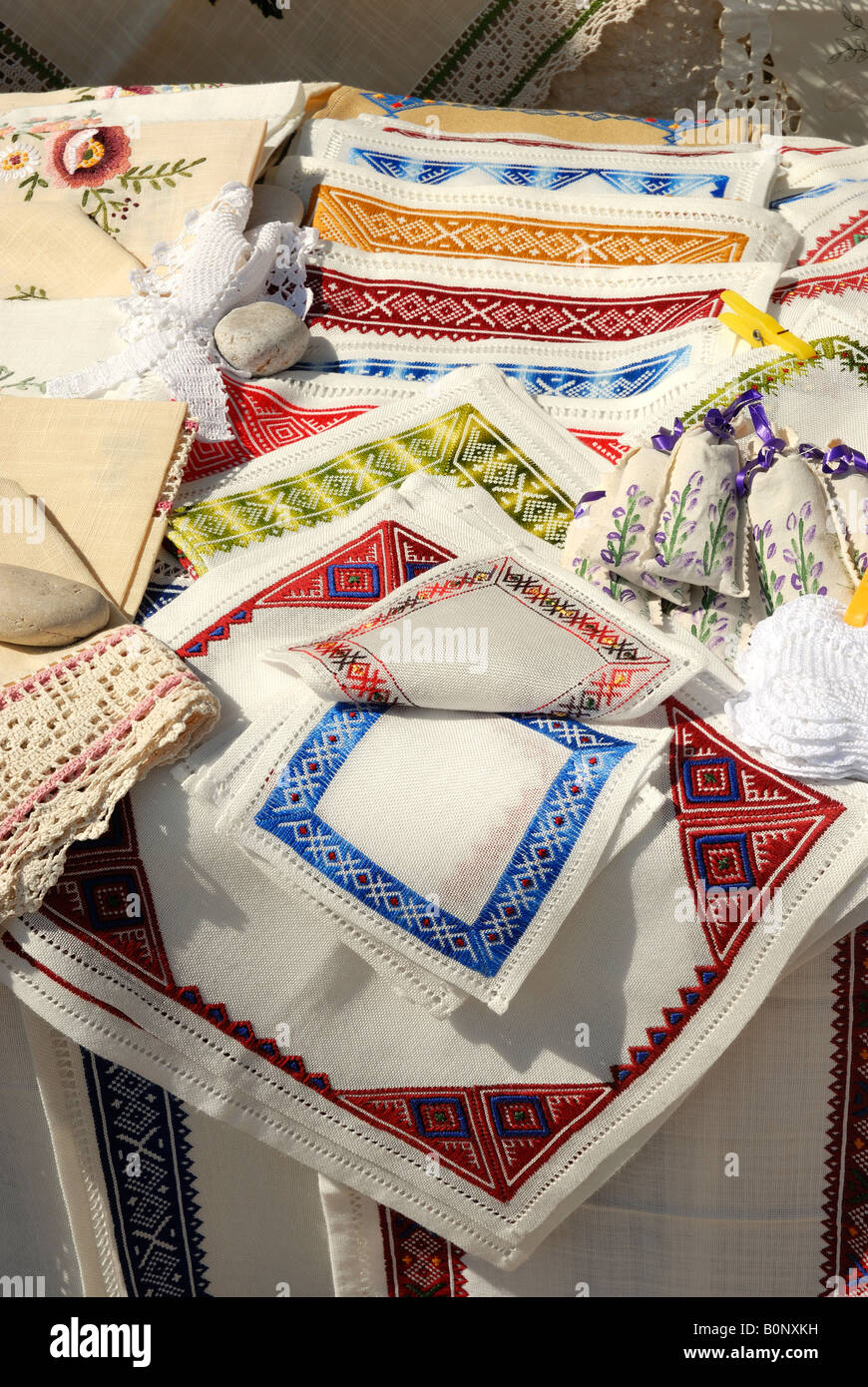 Traditional needle work on sale at the market in the old port of ...