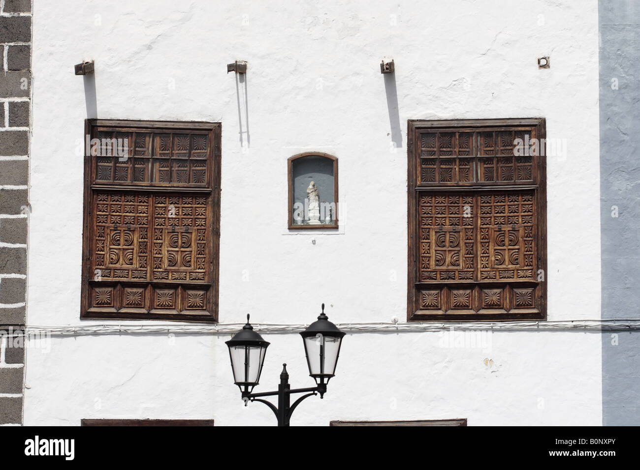 Typical wooden carved window shutters on a house in Garachico Tenerife ...