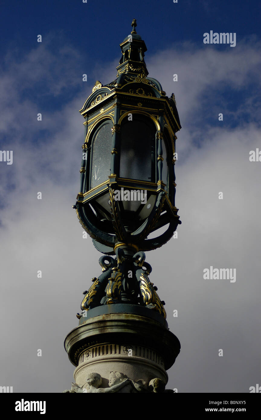 An ornate gilded lantern in central Edinburgh from below with clouded ...