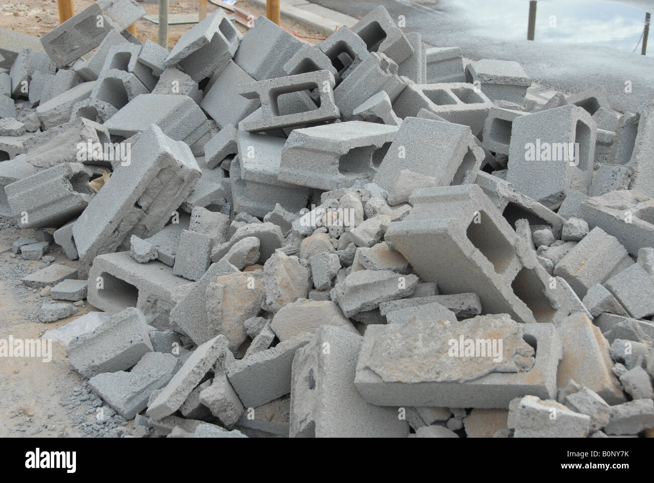 A pile of grey cement bricks Stock Photo - Alamy