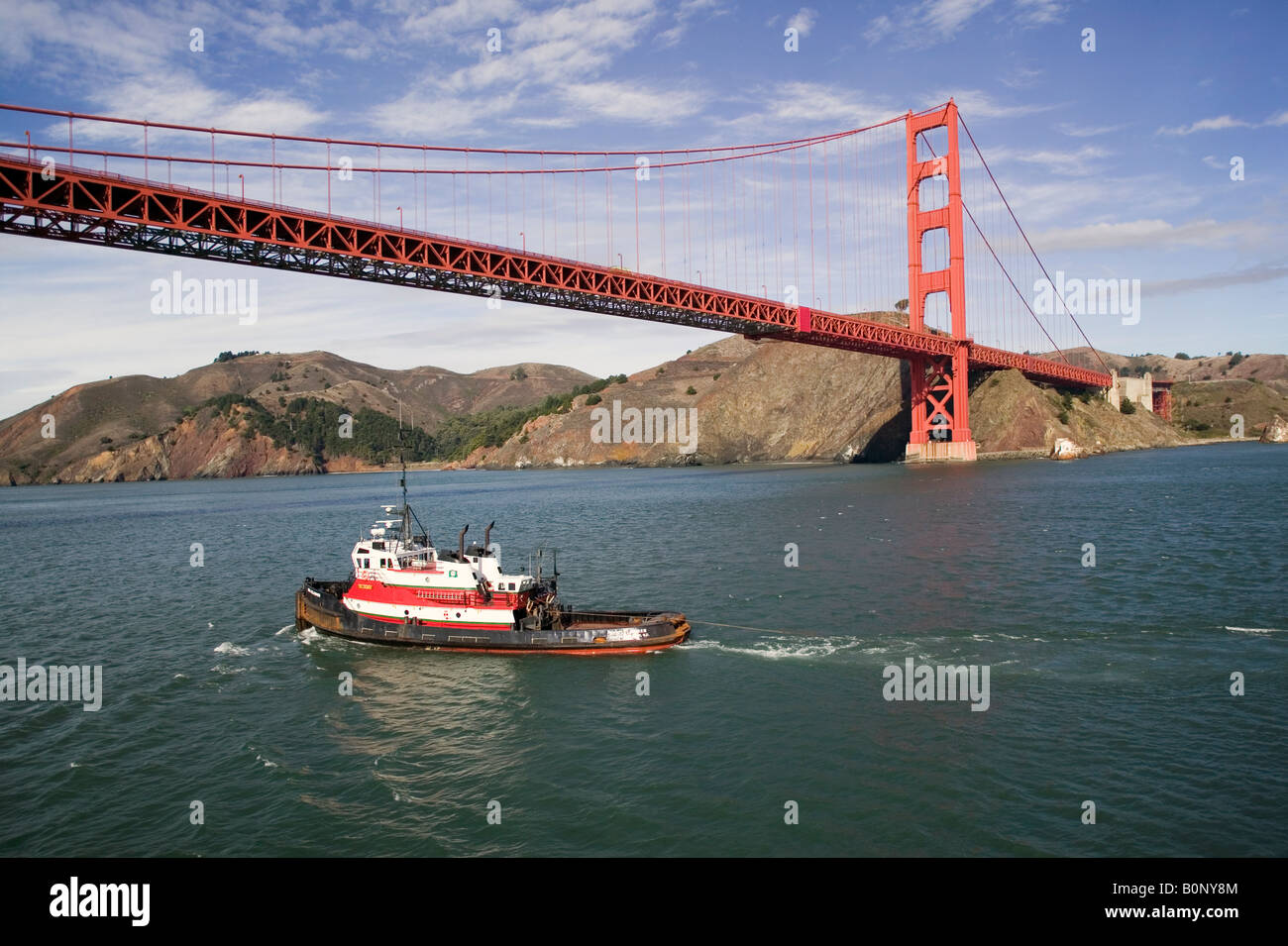 aerial above tug boat approaching Golden Gate bridge San Francisco ...