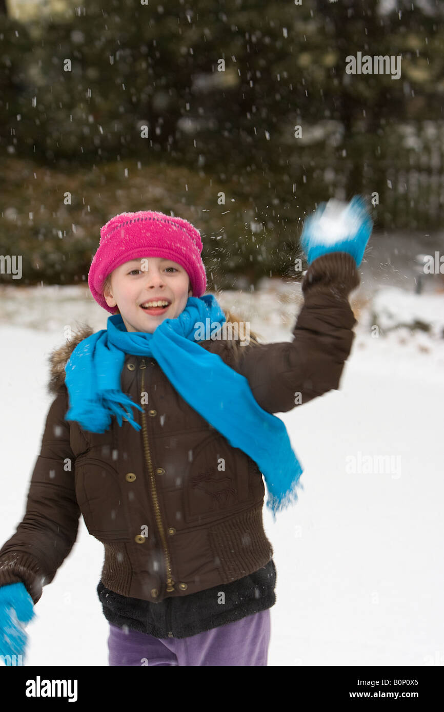 Child throwing a snowball Stock Photo - Alamy