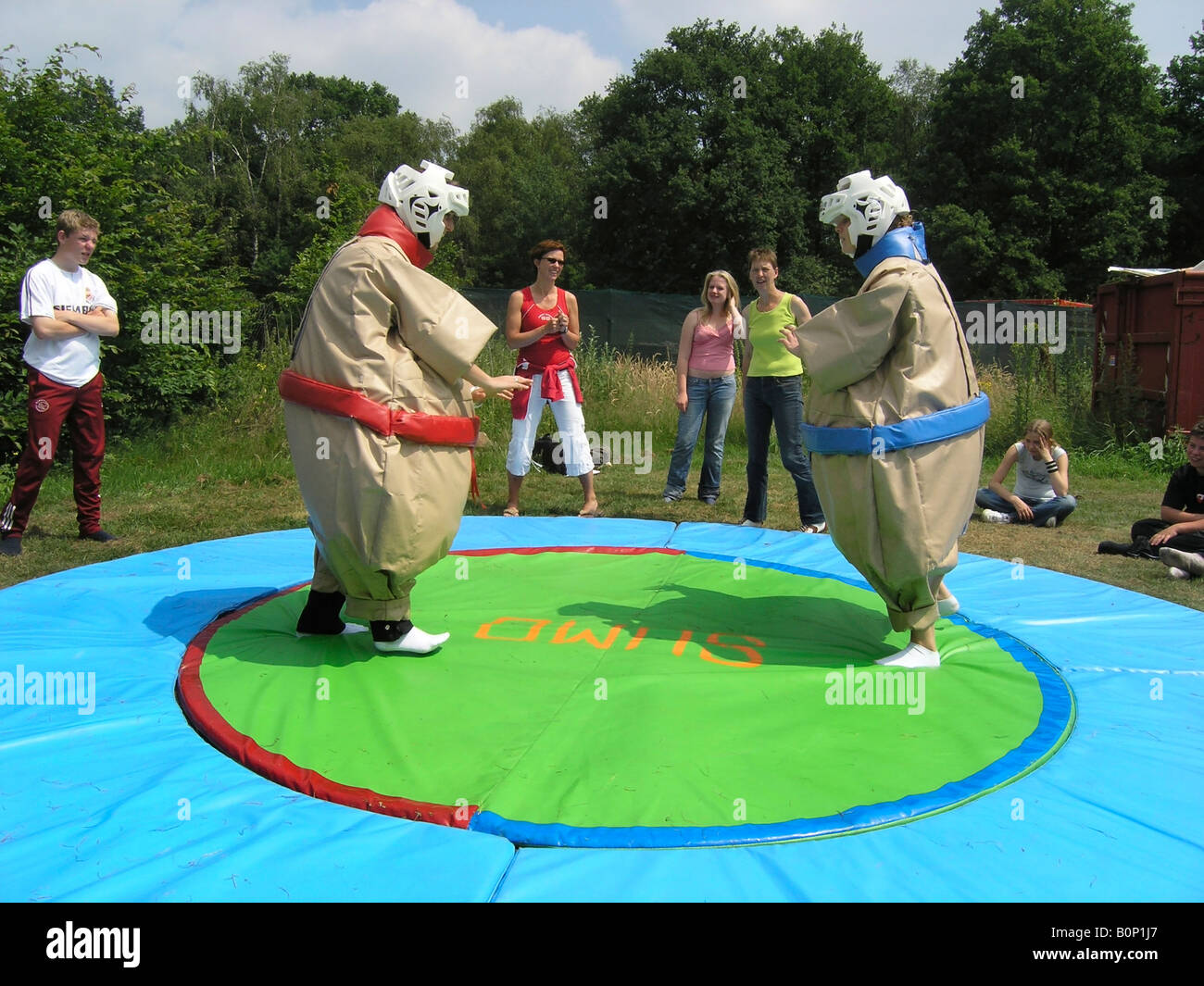 teenage student sumo wrestling at school camp Stock Photo - Alamy