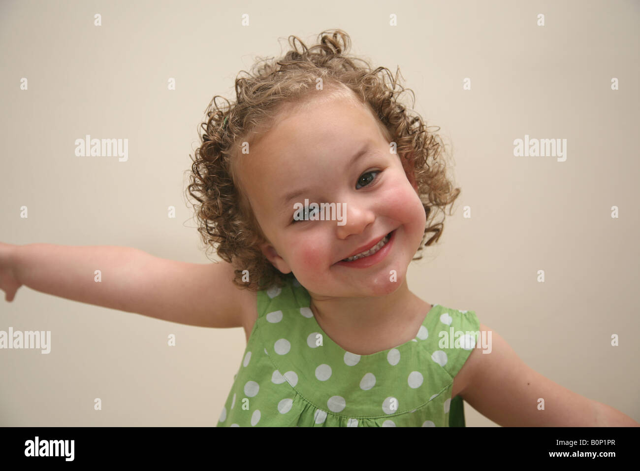 3 year old child smiling at the camera Stock Photo - Alamy