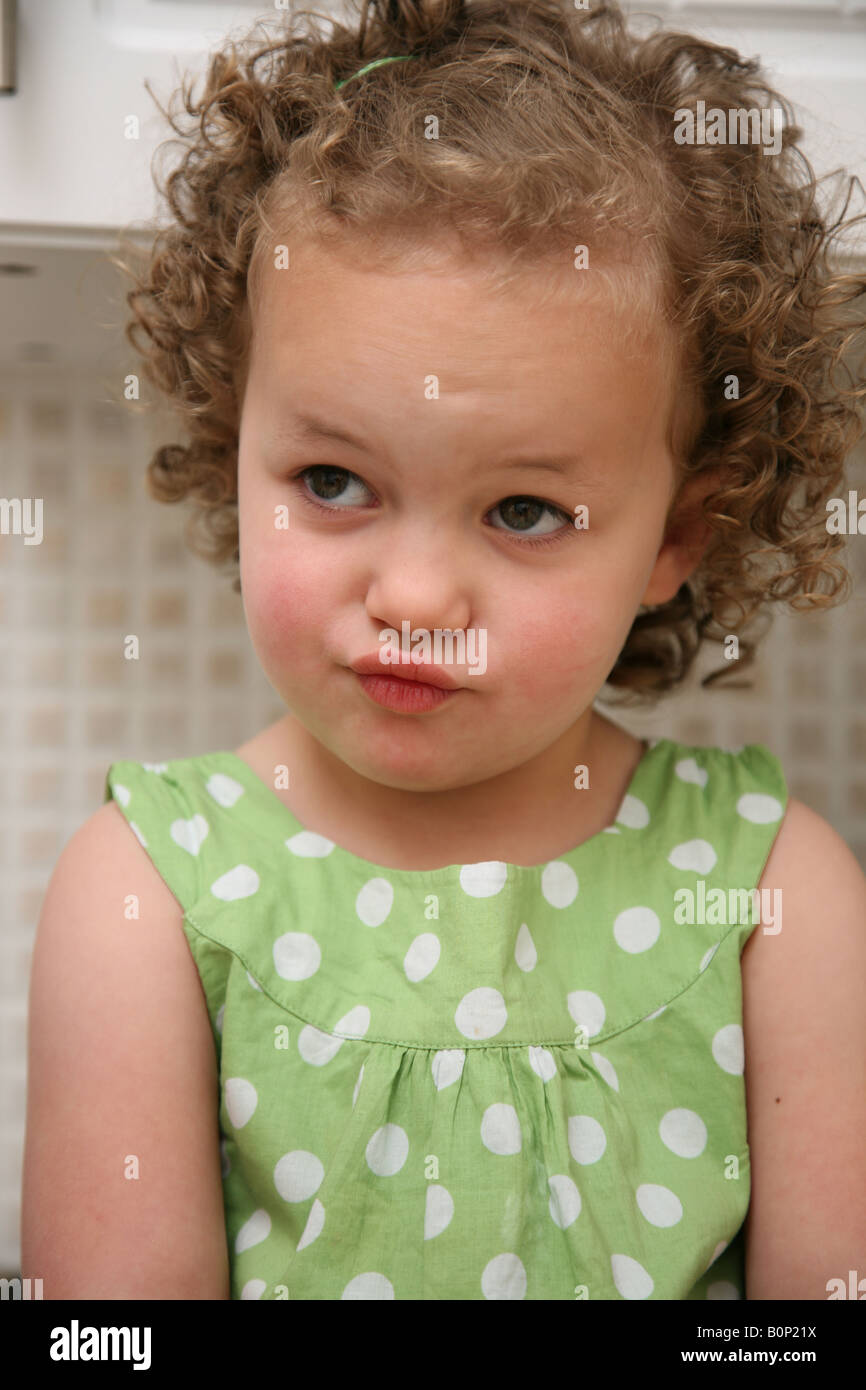 Stubborn toddler with puckered lips Stock Photo - Alamy