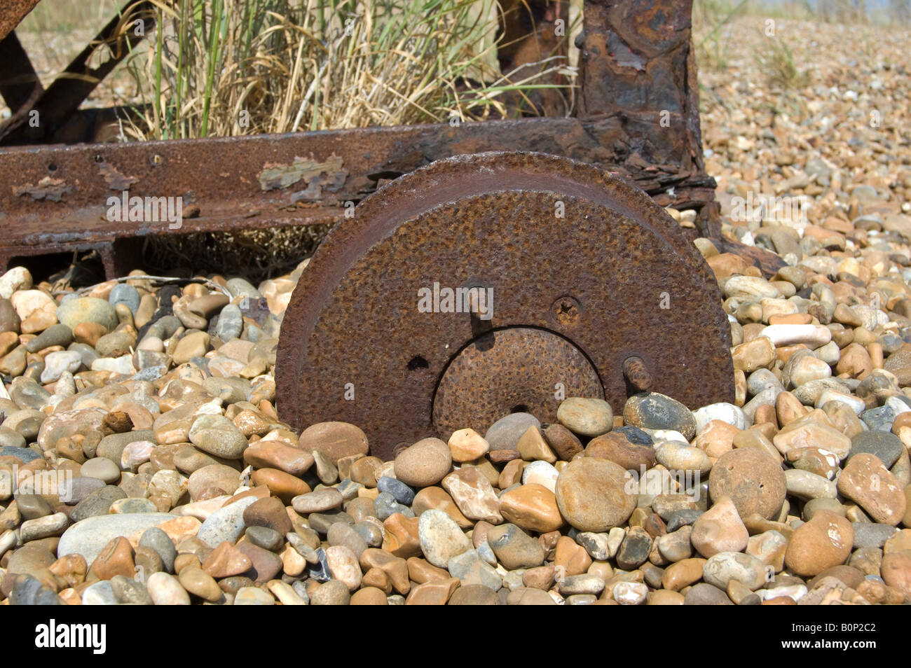 Detail of rusting wheel hub on Shingle Street beach, Suffolk Stock ...
