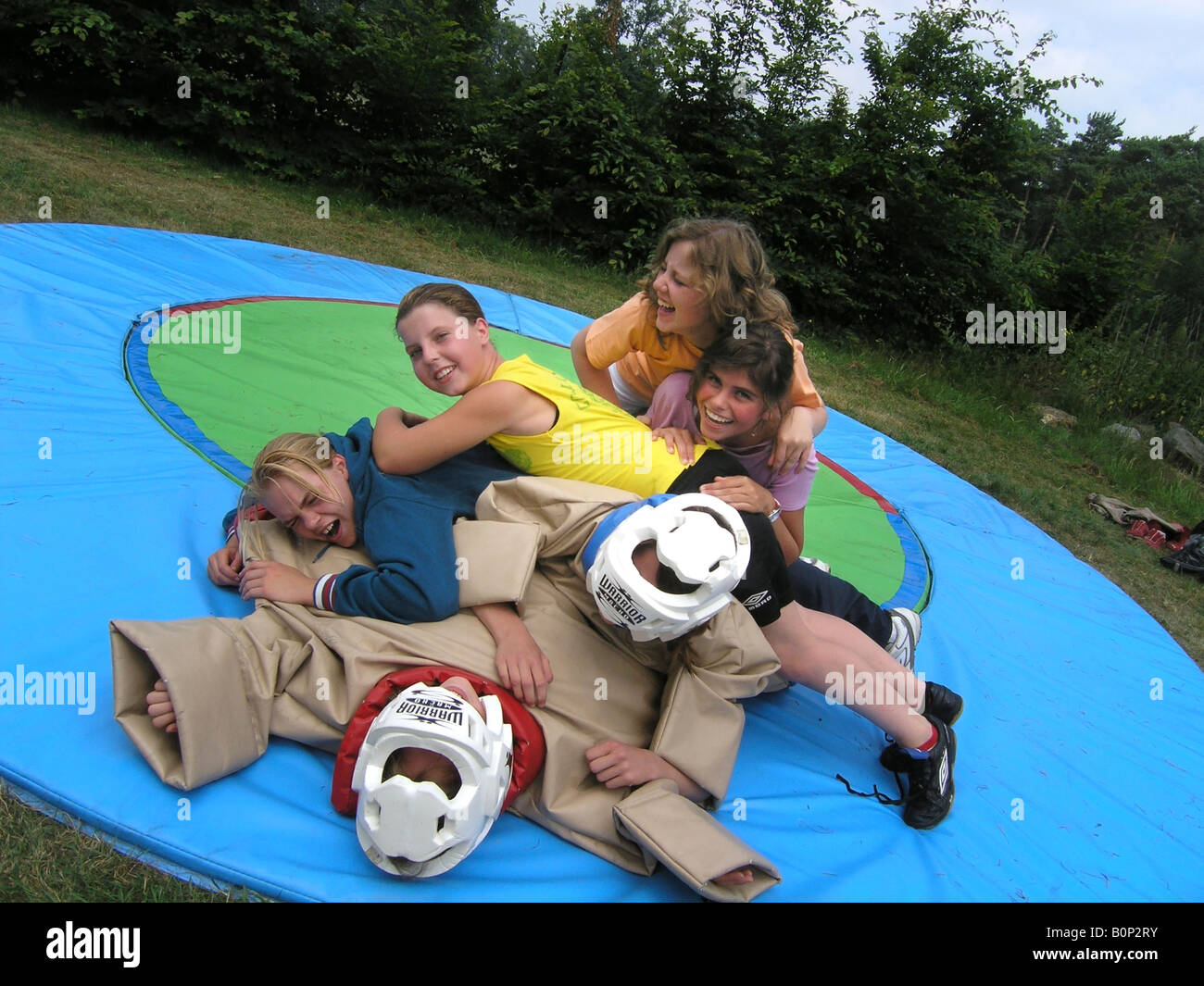 girl students sumo wrestling at school camp Stock Photo - Alamy