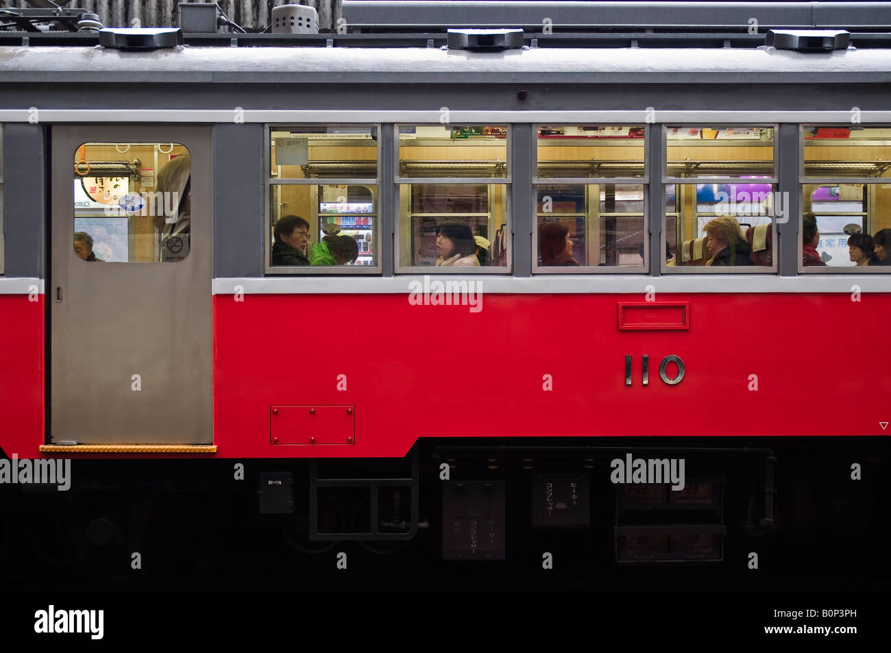 Japanese commuters on Hakone Tozan train Stock Photo - Alamy