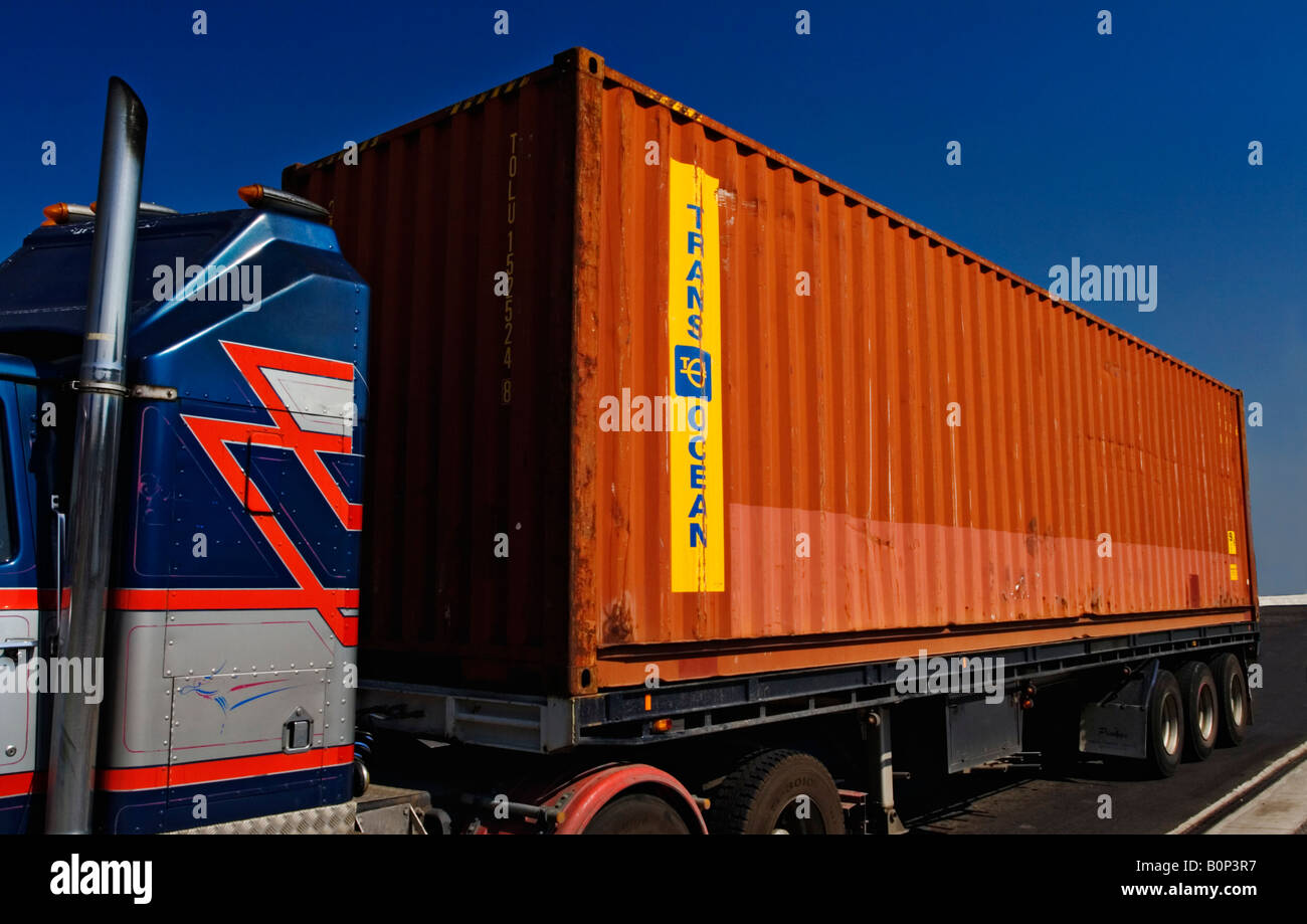 Transportation and Trucking / A Semi - Trailer transporting a Shipping ...