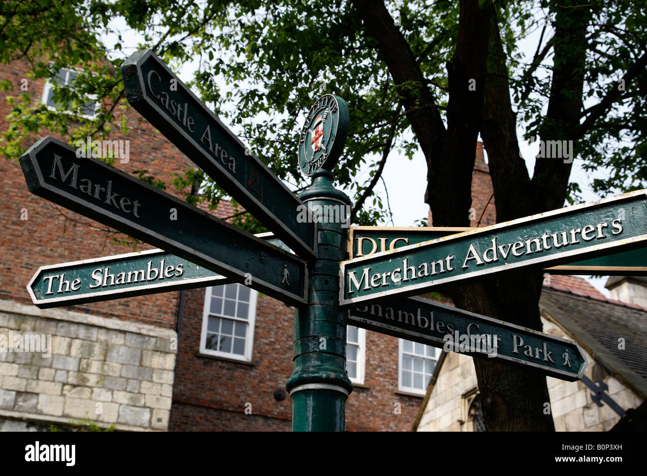 tourist signpost showing directions to popular attractions the shambles ...