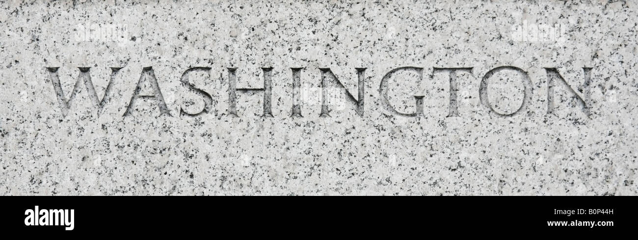 Washington state name written in grey granite stone Stock Photo - Alamy