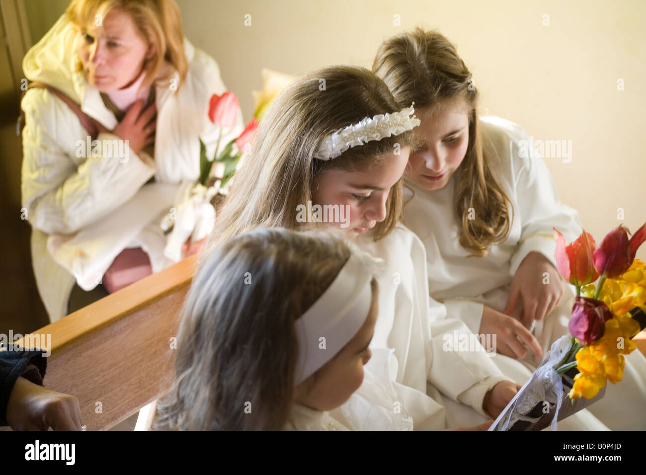 Little girls in church during the holy week in Enna Sicily Italy Stock ...