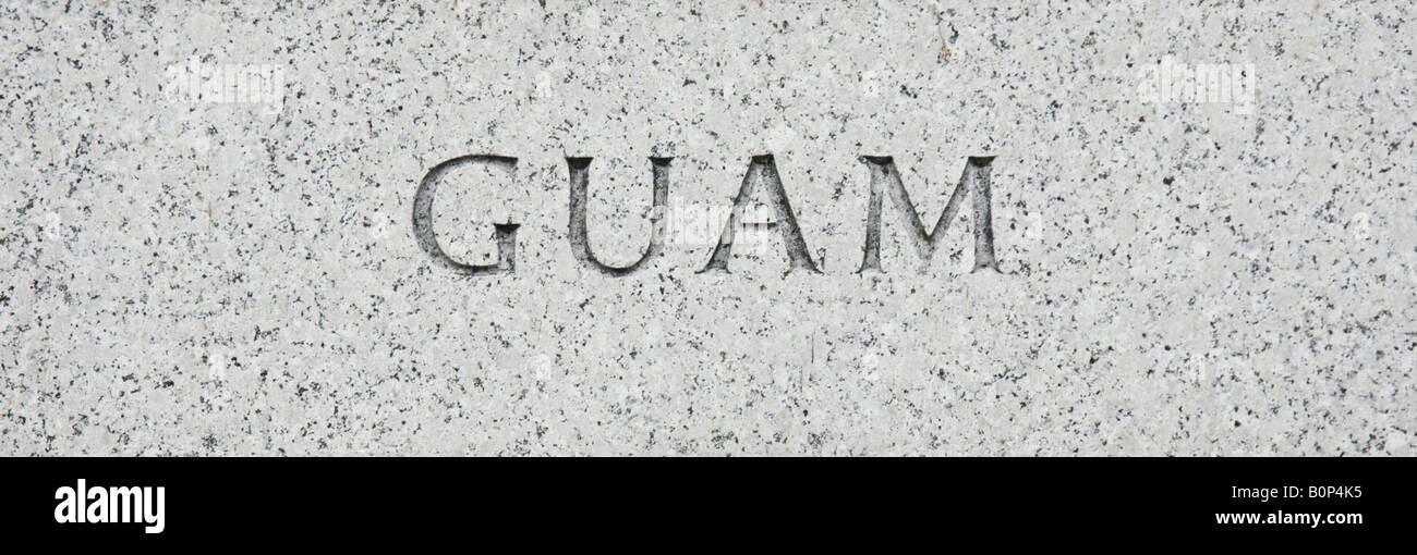 Guam territory name written in grey granite stone Stock Photo - Alamy