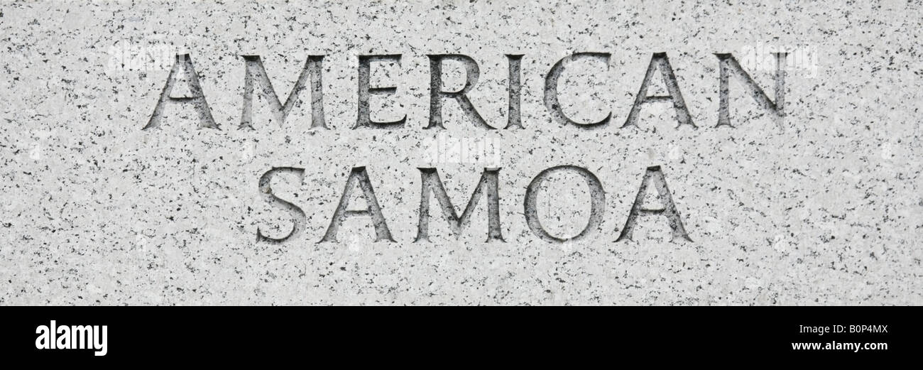 American Samoa territory name written in grey granite stone Stock Photo ...