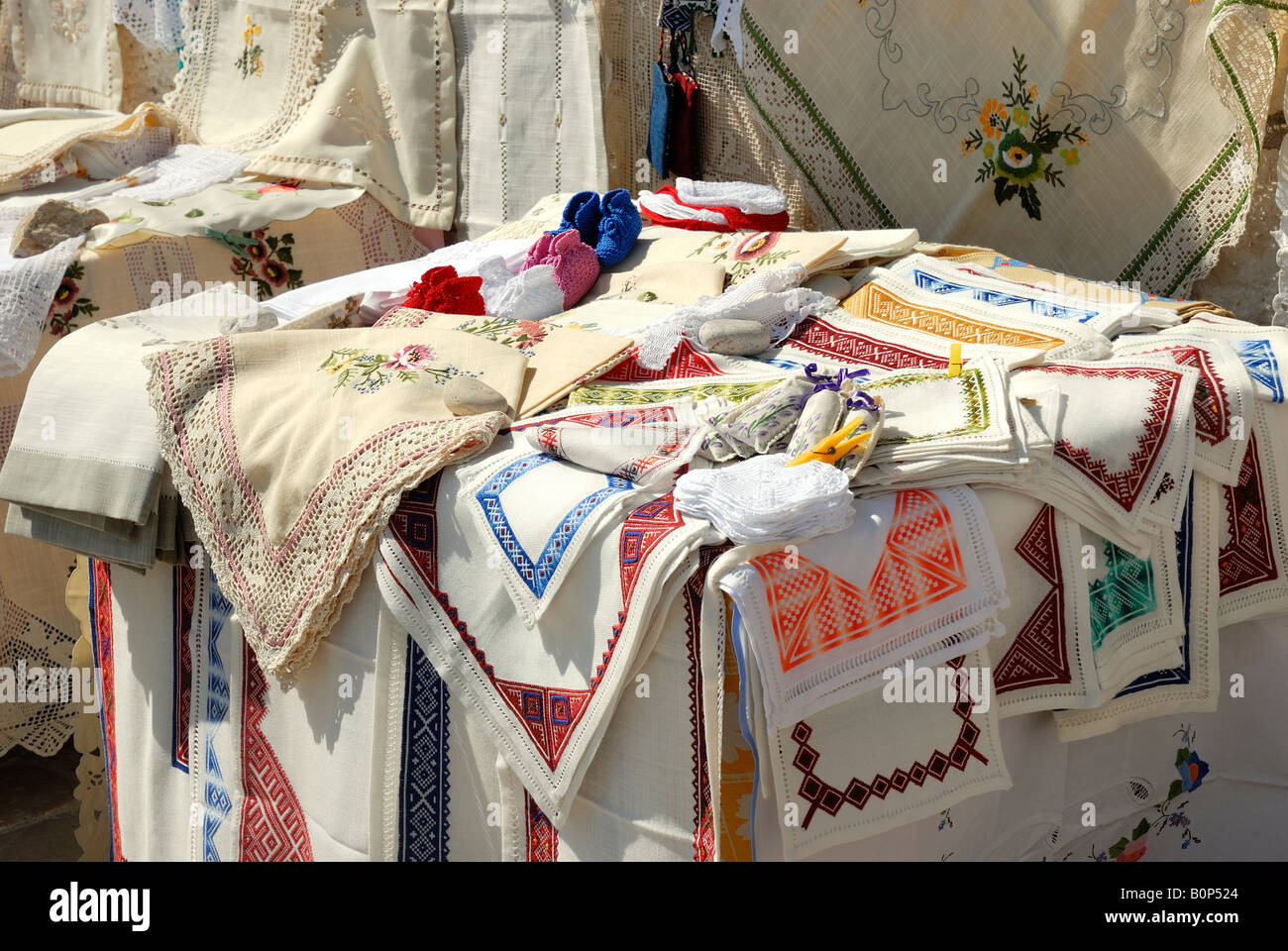 Traditional needle work on sale at the market in the old port of ...