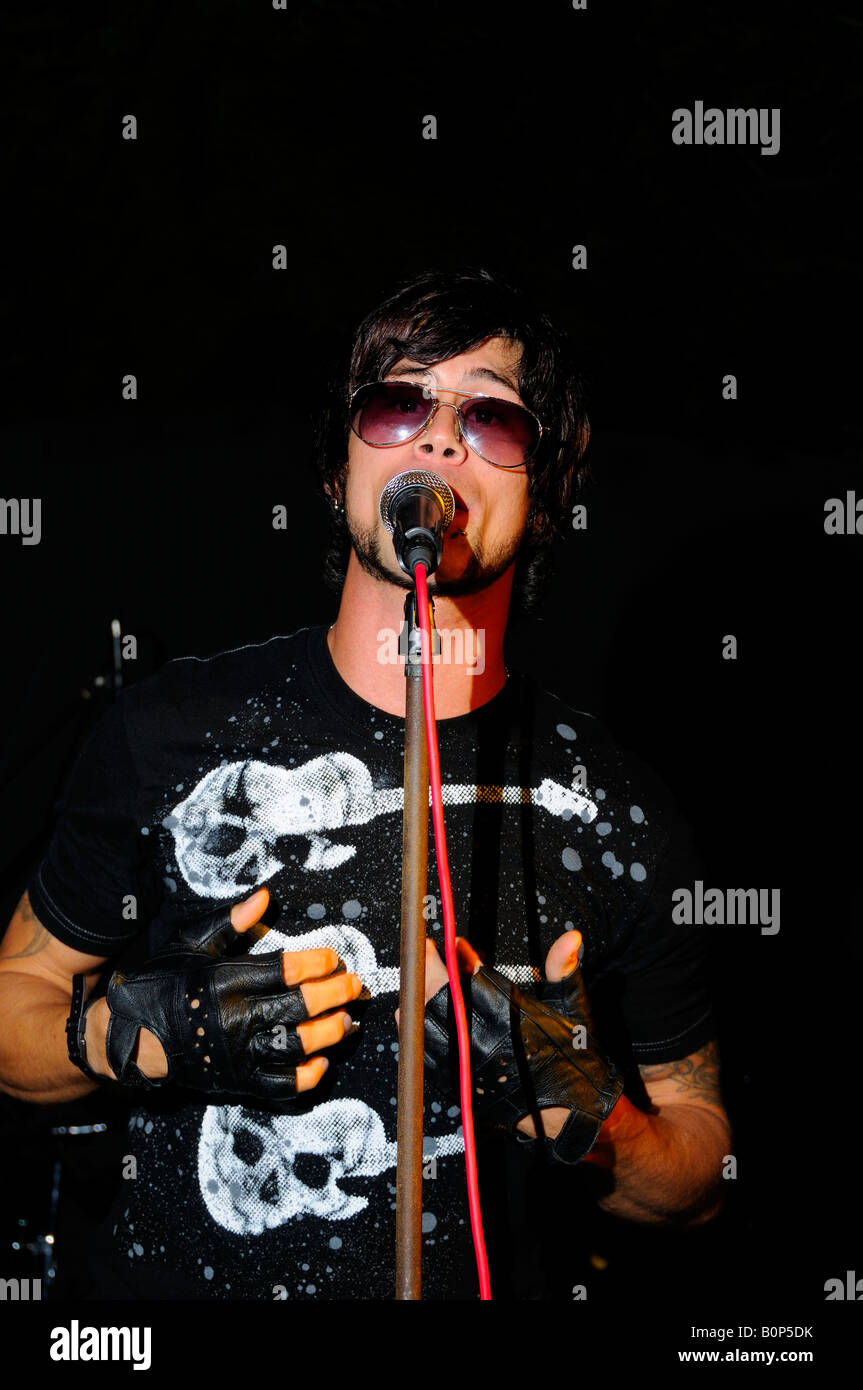 Portrait of young male singer performing live on a rock concert Stock ...