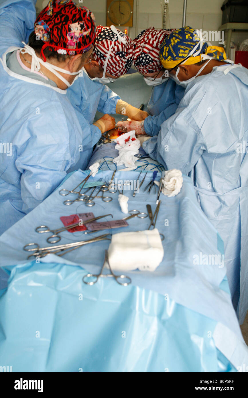 A surgical team operates on a patient during a 2006 surgical mission to ...