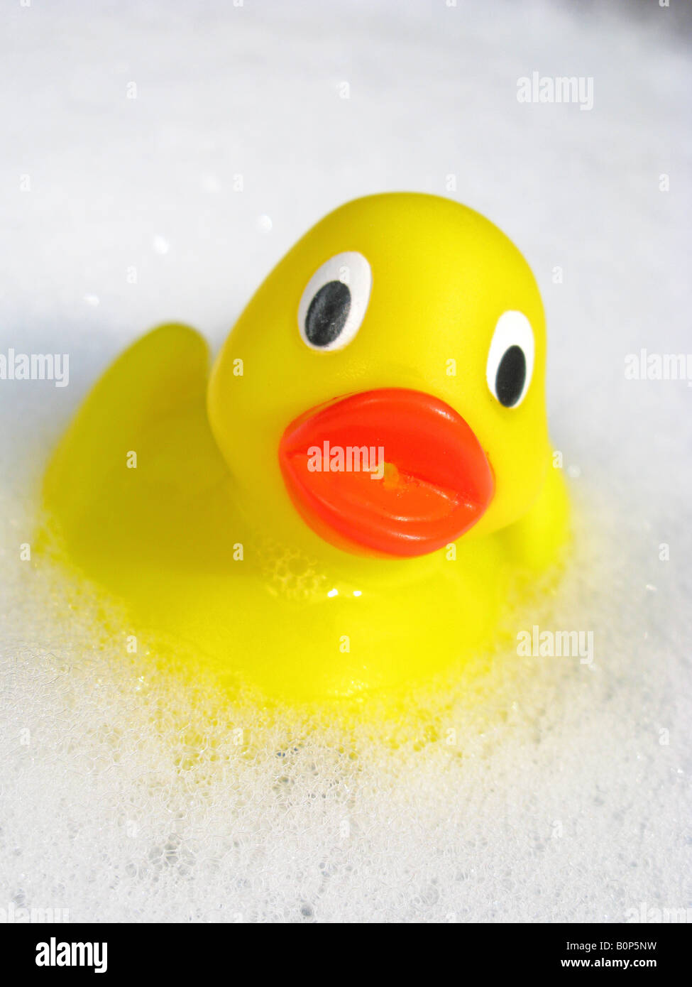 A yellow rubber duck in a bubble bath Stock Photo - Alamy